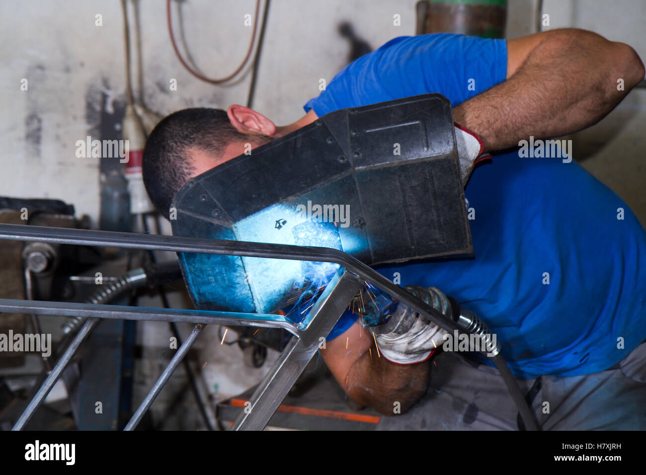 metalworker at work in his workshop Stock Photo - Alamy