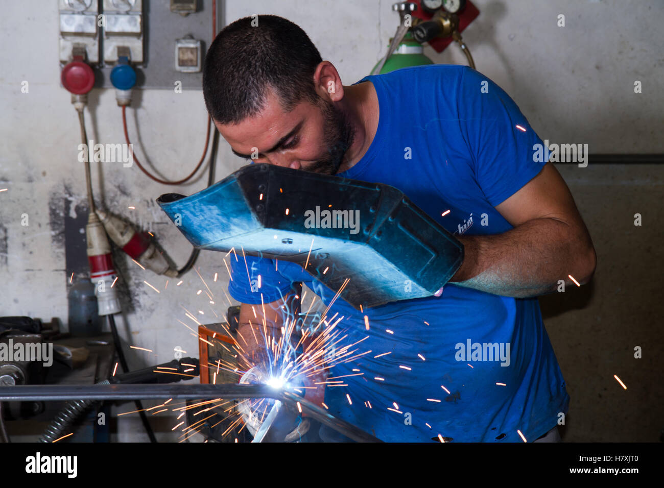 metalworker at work in his workshop Stock Photo - Alamy