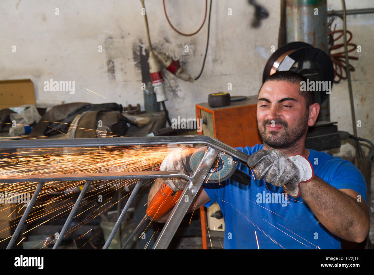 metalworker at work in his workshop Stock Photo - Alamy
