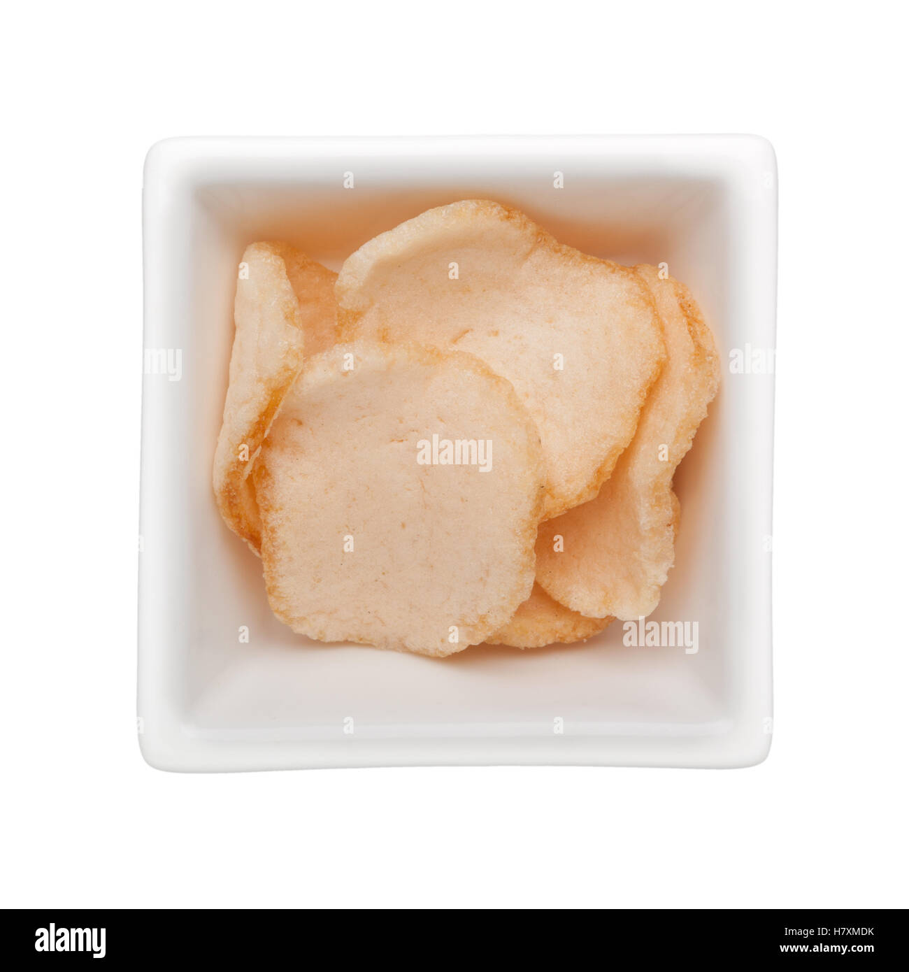 Prawn crackers in a square bowl isolated on white background Stock ...