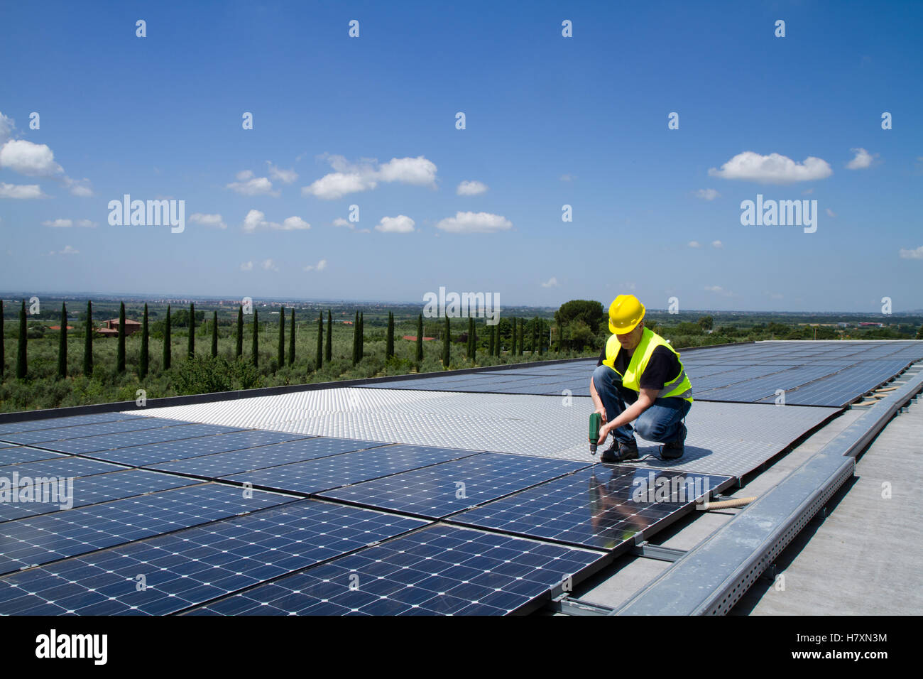 skilled worker working on a photovoltaic plant Stock Photo - Alamy