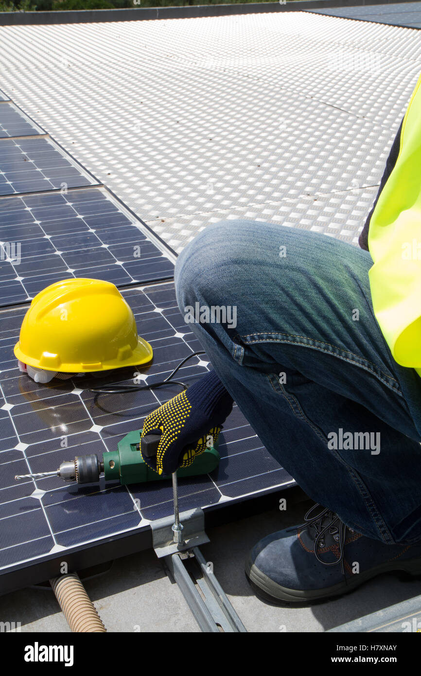 skilled worker at work on a photovoltaic plant Stock Photo - Alamy