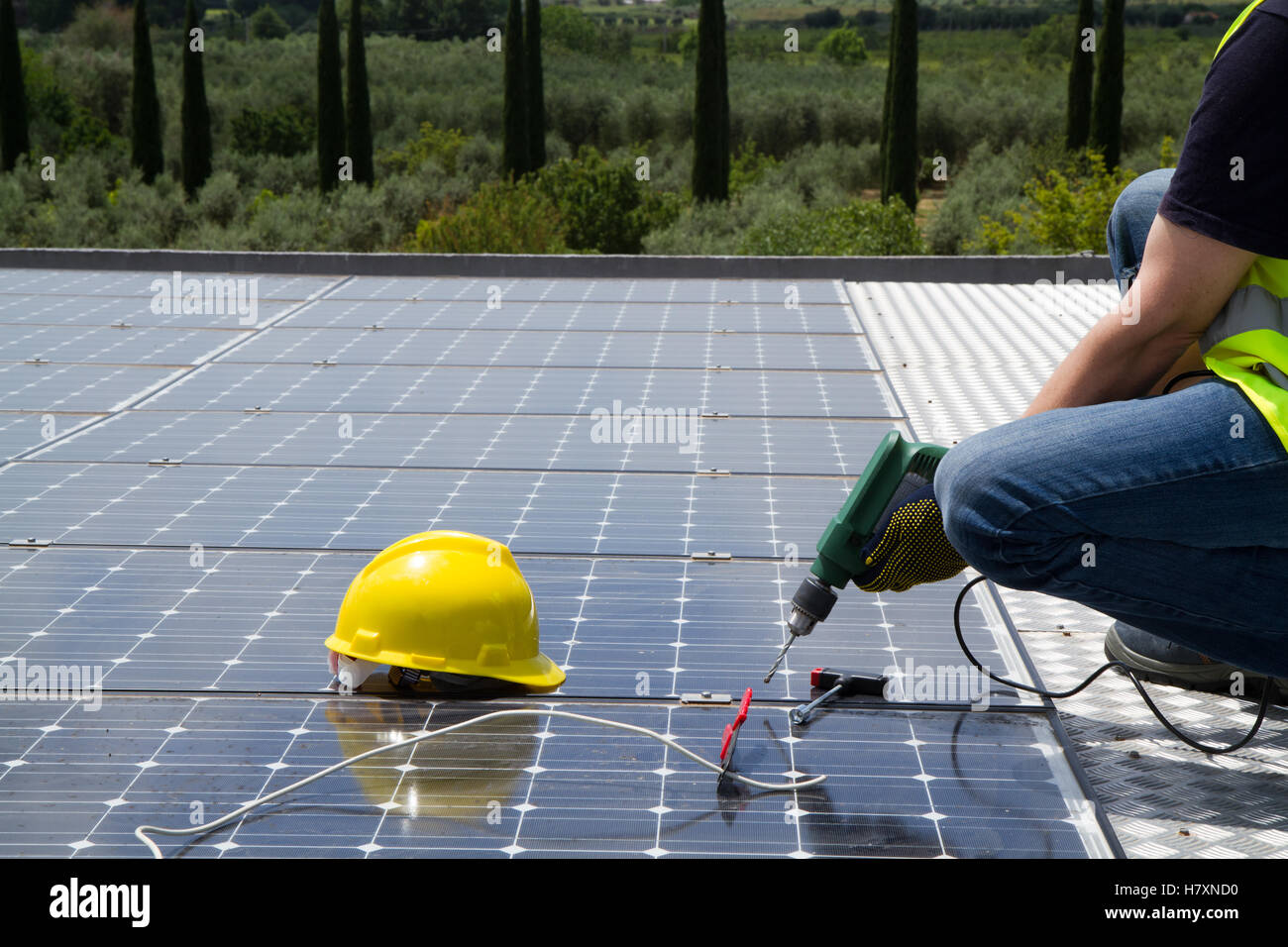 skilled worker at work on a photovoltaic plant Stock Photo - Alamy
