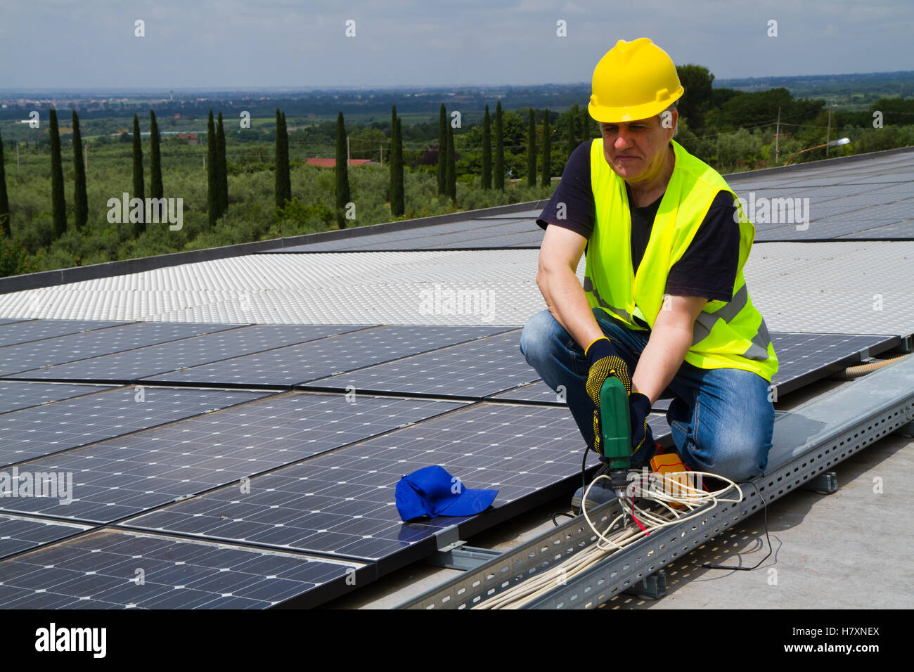 skilled worker working on a photovoltaic plant Stock Photo - Alamy
