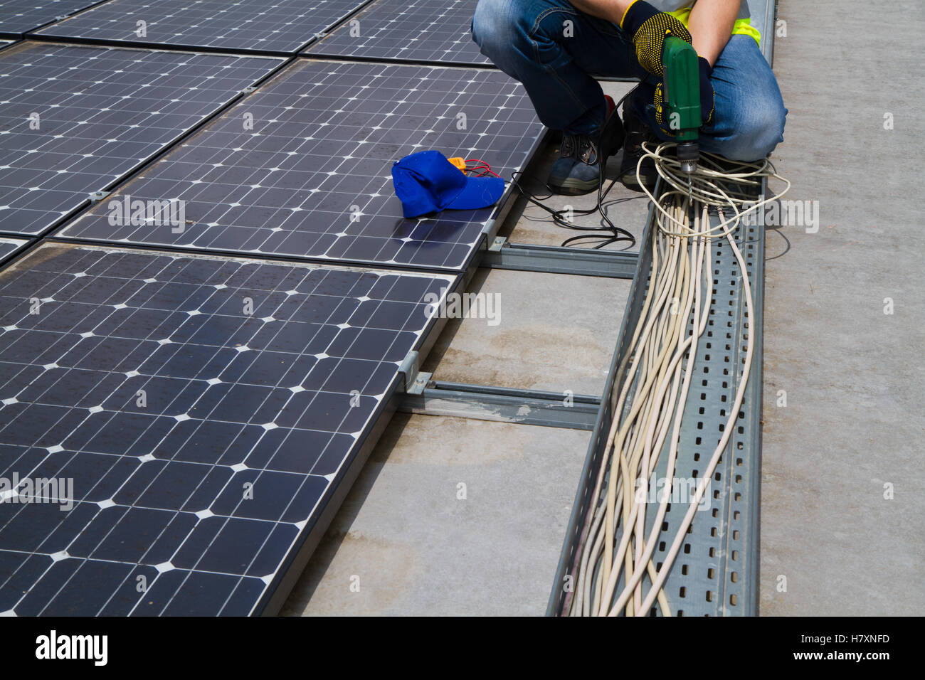 skilled worker at work on a photovoltaic plant Stock Photo - Alamy