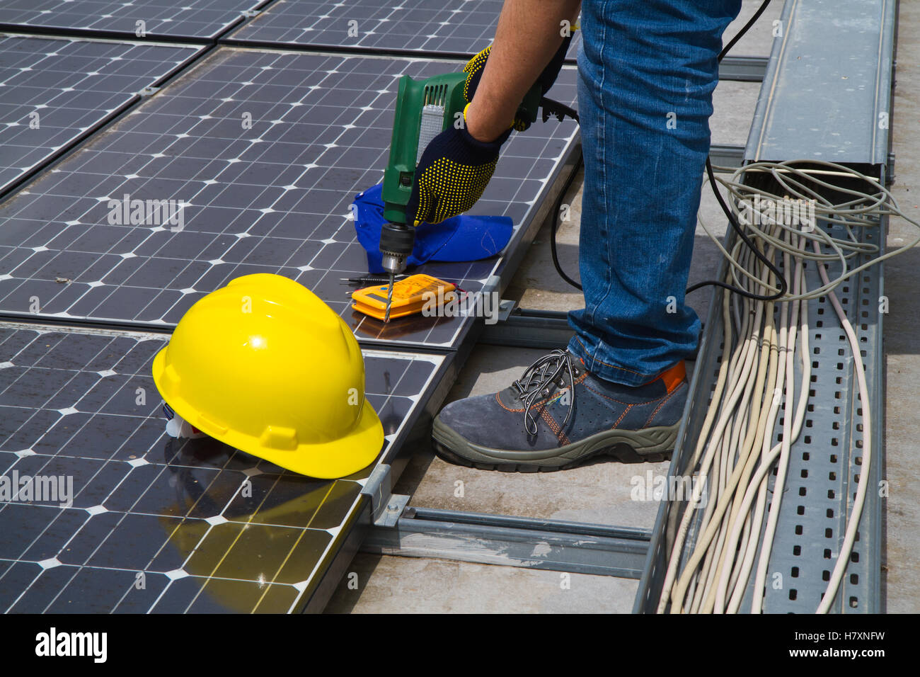 skilled worker at work on a photovoltaic plant Stock Photo - Alamy