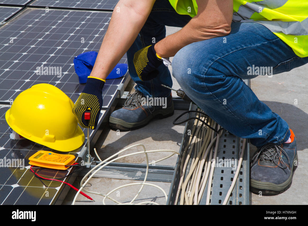 skilled worker at work on a photovoltaic plant Stock Photo - Alamy