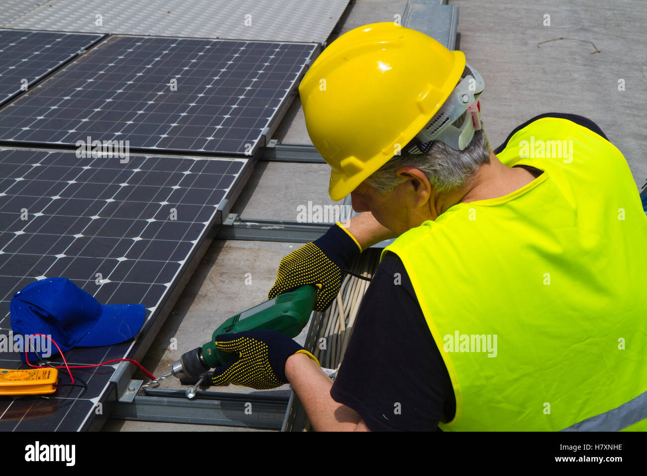 skilled worker working on a photovoltaic plant Stock Photo - Alamy