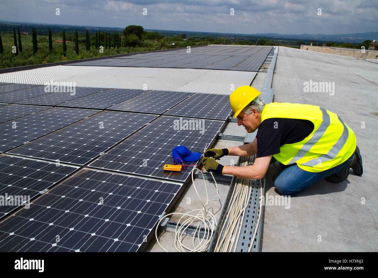skilled worker working on a photovoltaic plant Stock Photo - Alamy