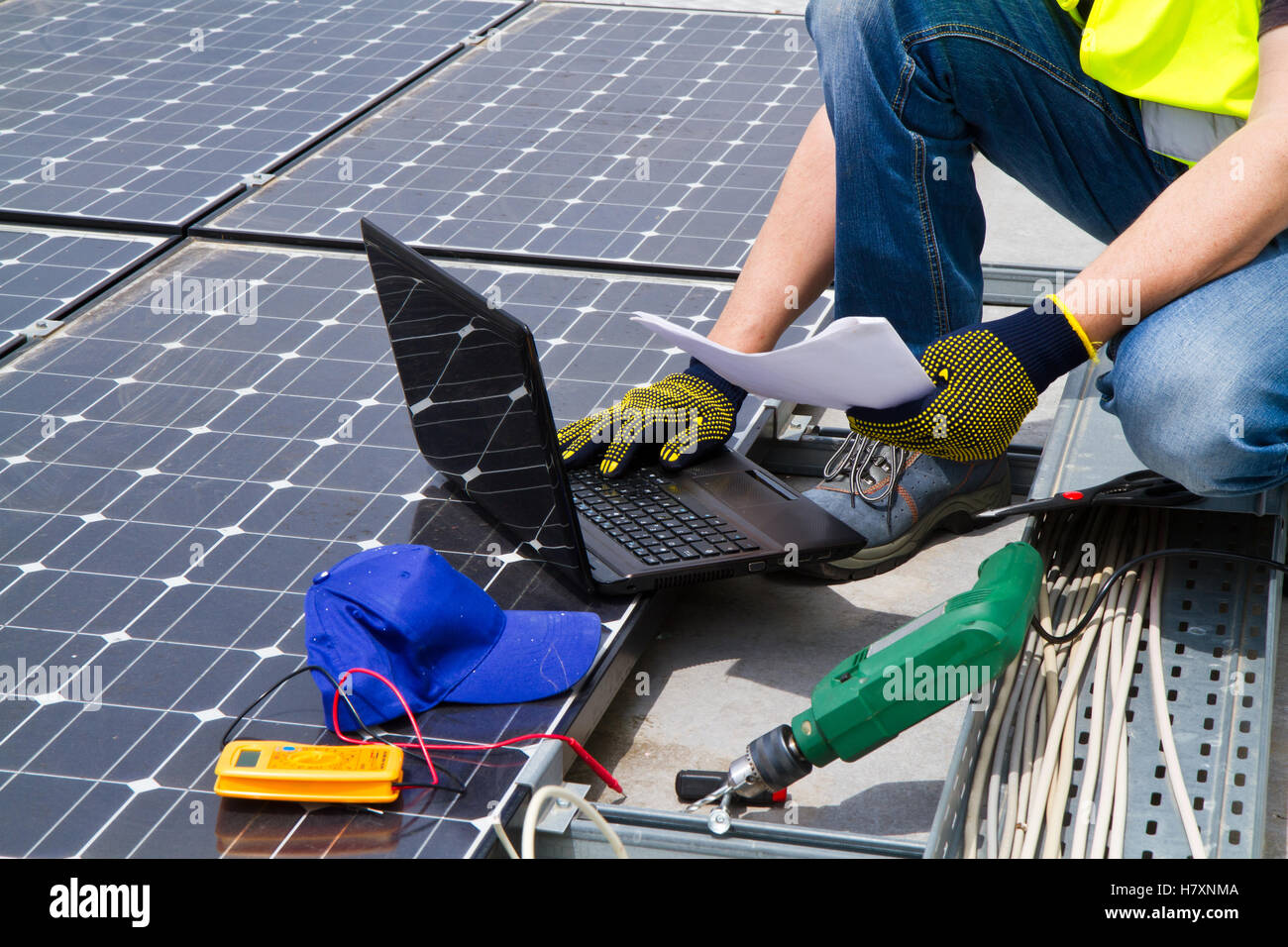 skilled worker working on a photovoltaic plant Stock Photo - Alamy