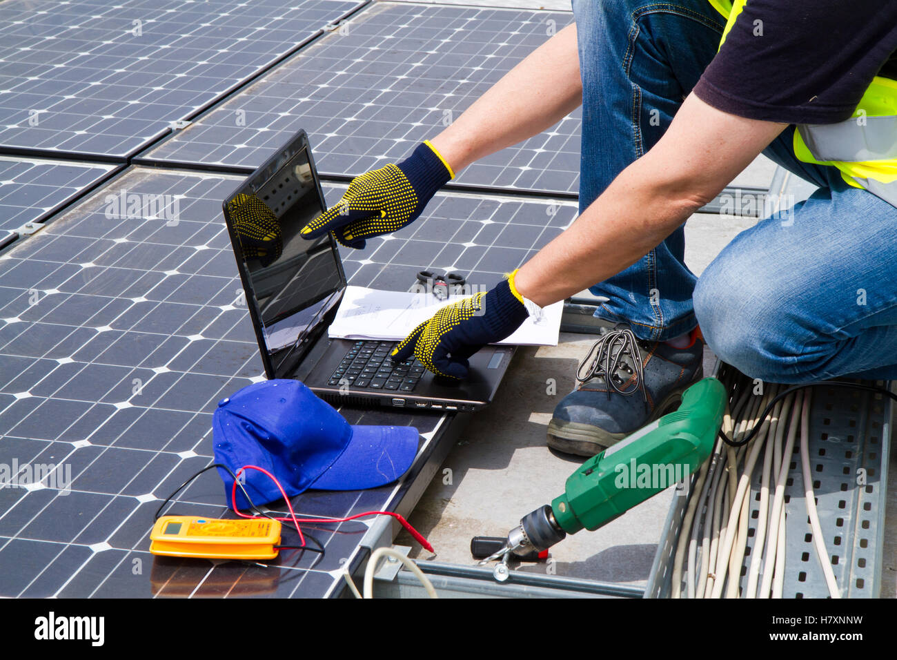 skilled worker at work on a photovoltaic plant Stock Photo - Alamy