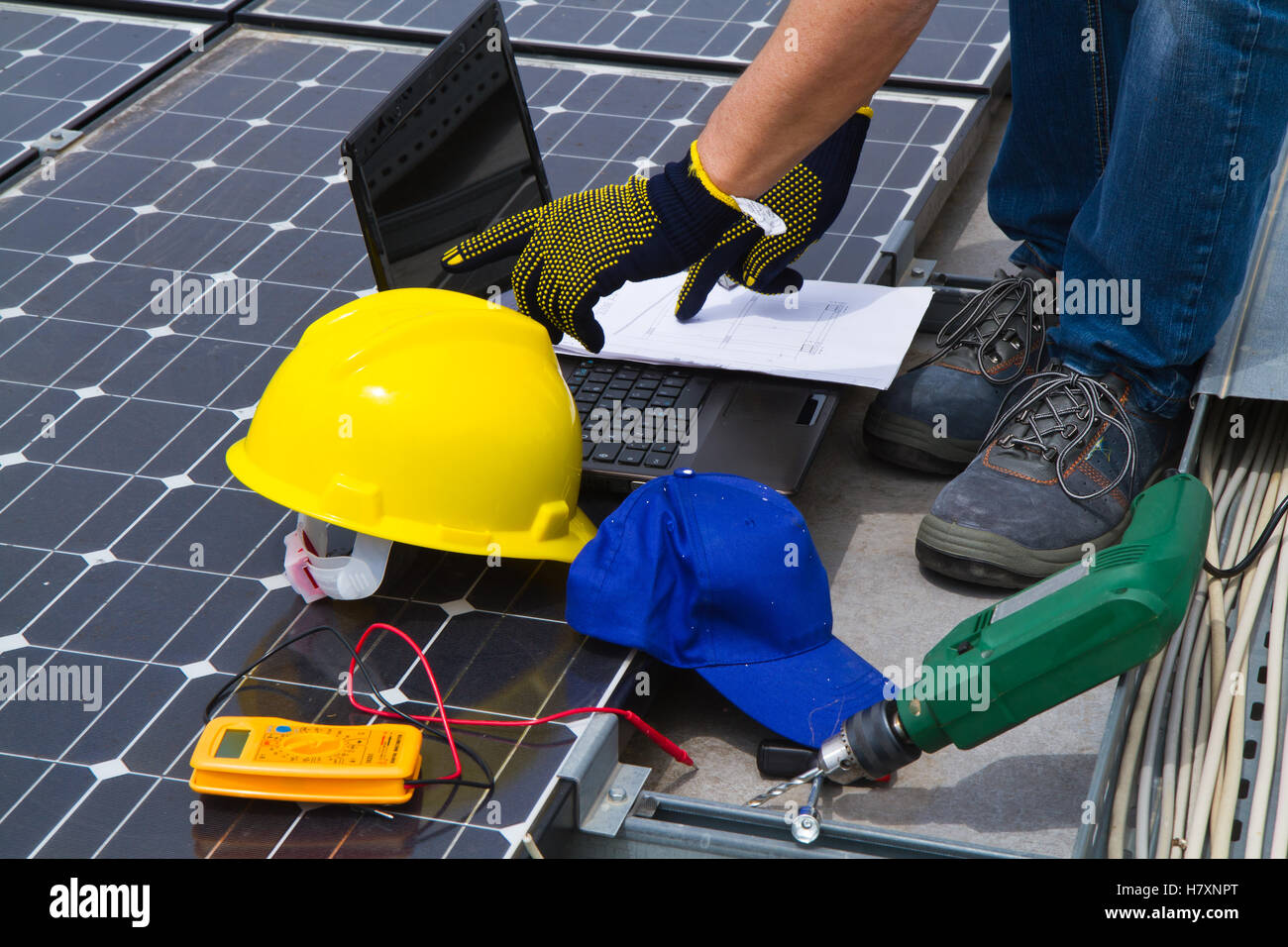 skilled worker at work on a photovoltaic plant Stock Photo - Alamy