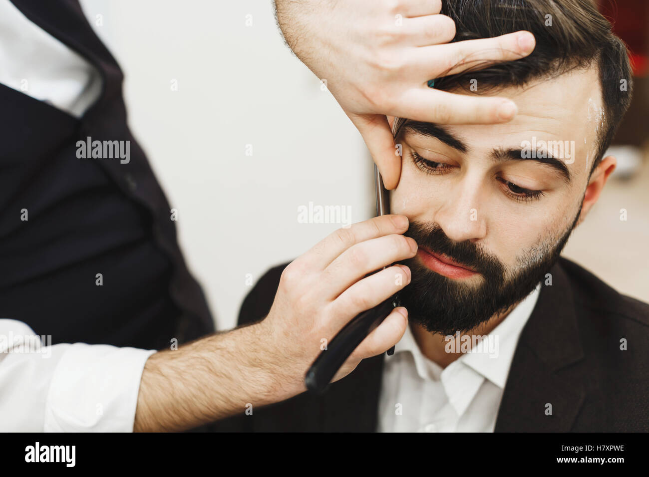 Man's hands making a beard Stock Photo - Alamy