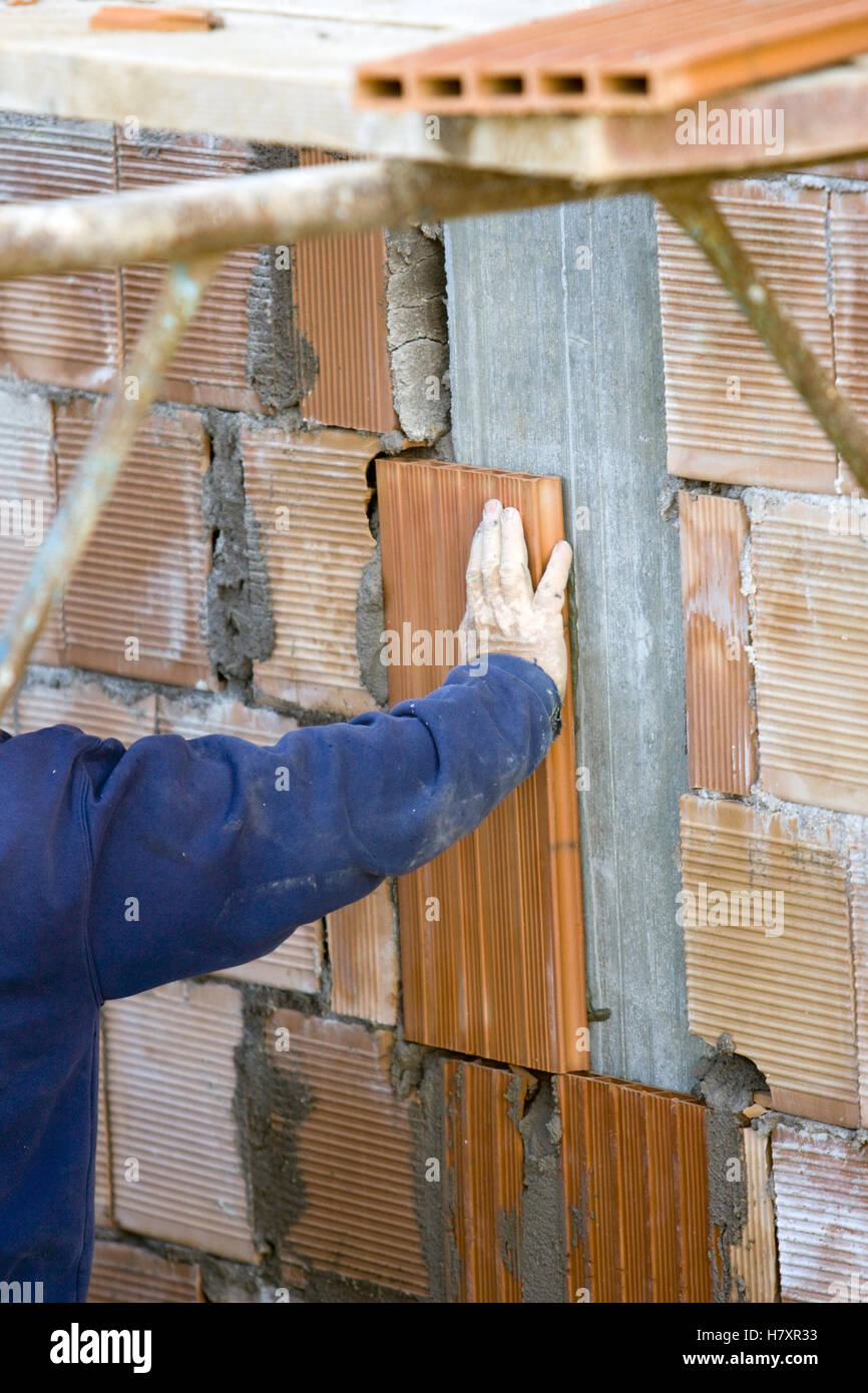 bricklayer at work in a site Stock Photo - Alamy