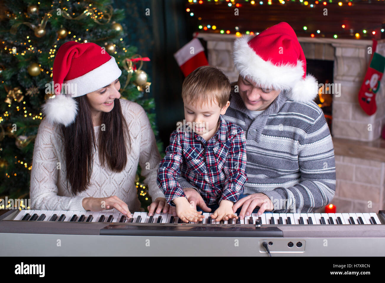 Kid wearing christmas hat hi-res stock photography and images - Alamy