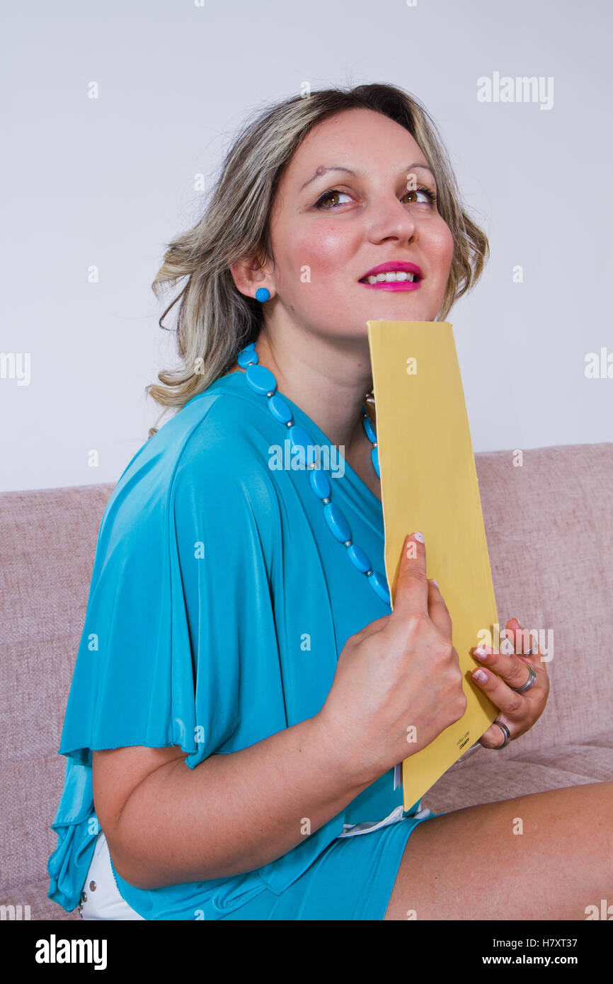 woman reading charts and reports Stock Photo - Alamy