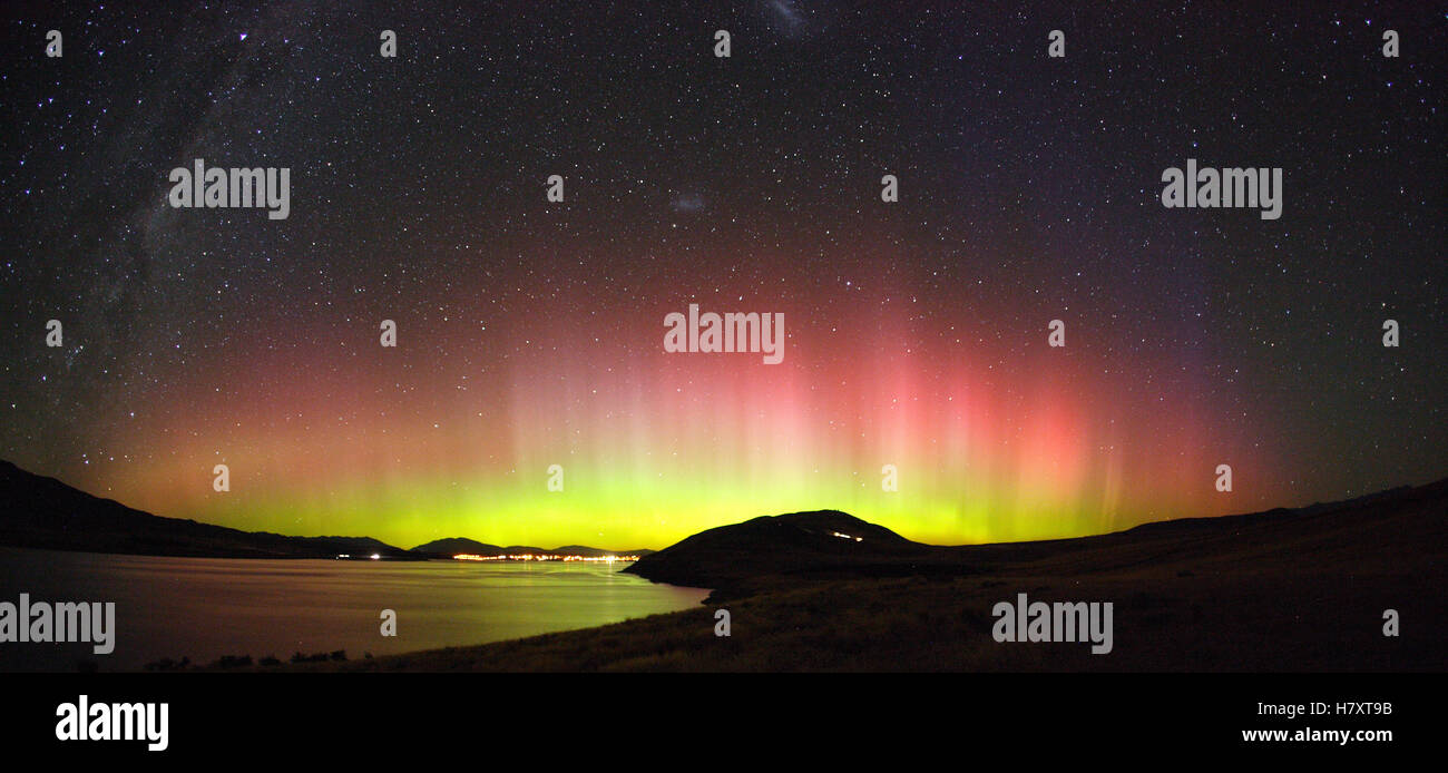 Night sky and southern lights over Lake Tekapo and village, Mackenzie ...