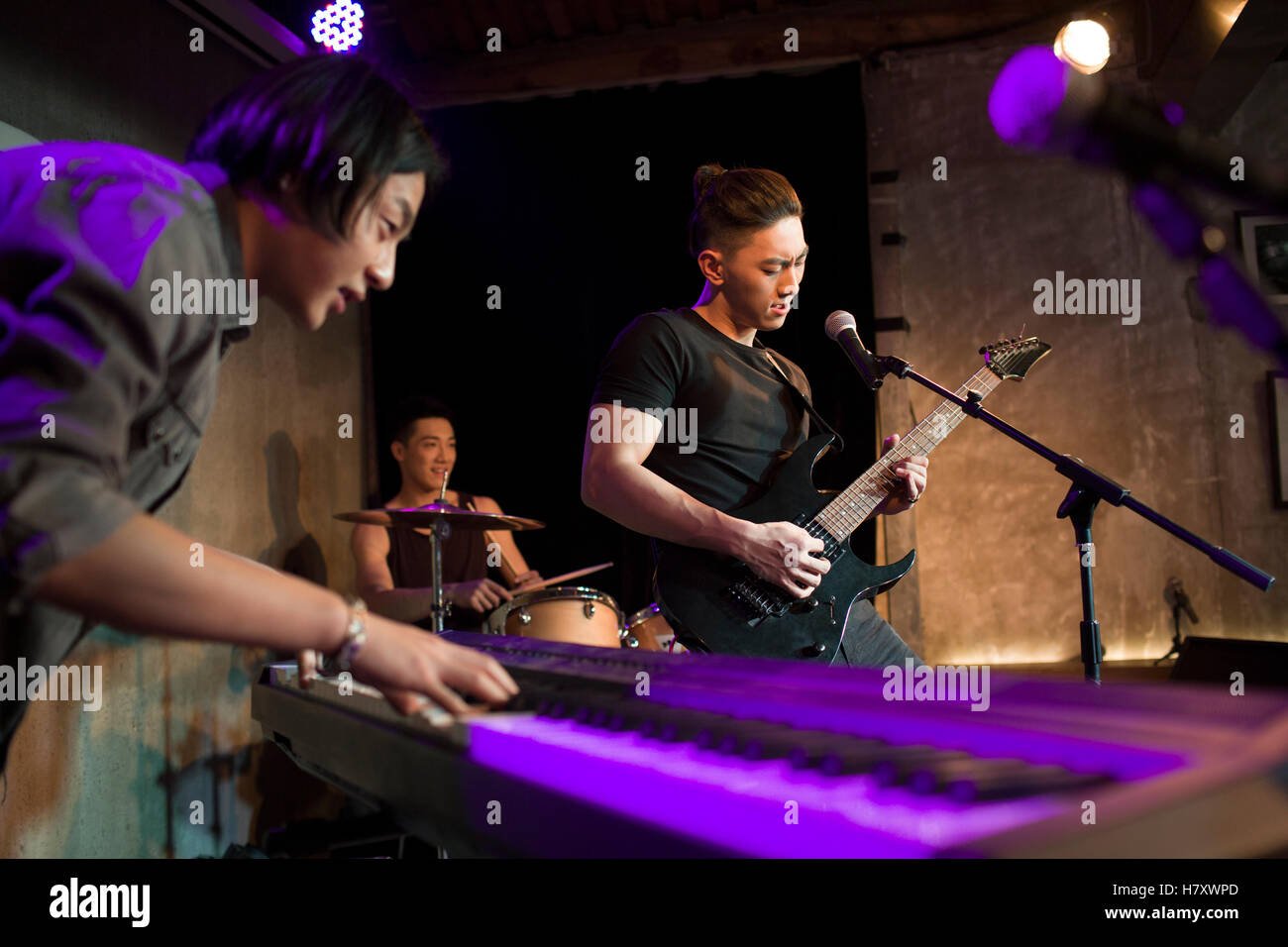 Chinese musical band performing on stage Stock Photo - Alamy
