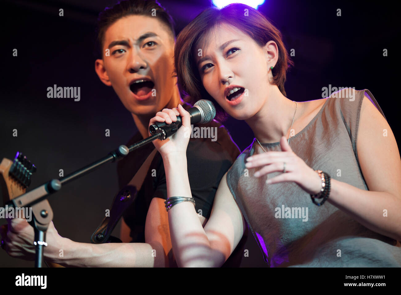 Chinese musical band performing on stage Stock Photo - Alamy