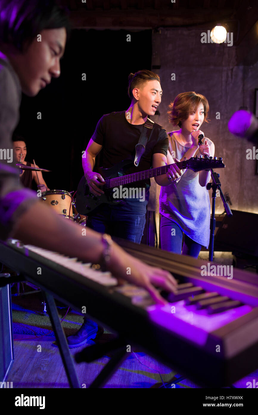 Chinese musical band performing on stage Stock Photo - Alamy