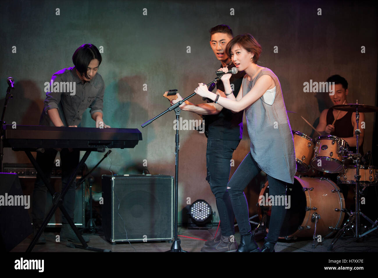 Chinese musical band performing on stage Stock Photo - Alamy