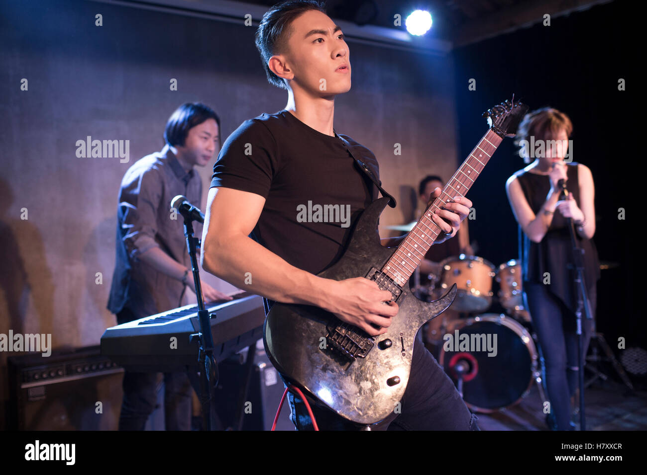 Chinese musical band performing on stage Stock Photo - Alamy