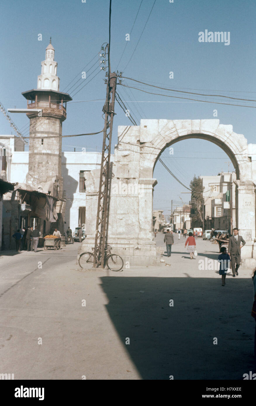 Street scene at roman arch in the "Damascus Straight Street" in the old ...