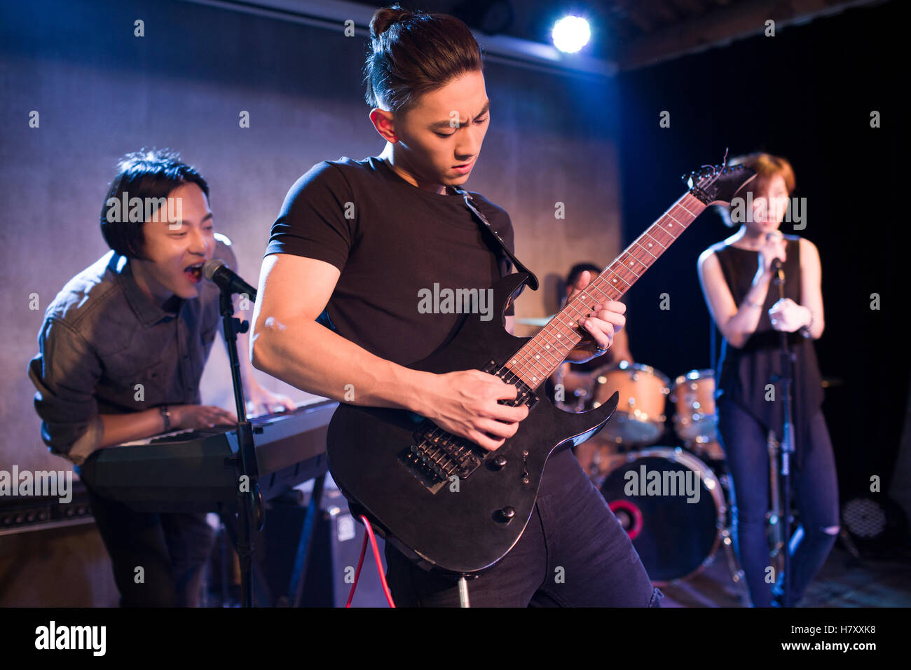 Chinese musical band performing on stage Stock Photo - Alamy