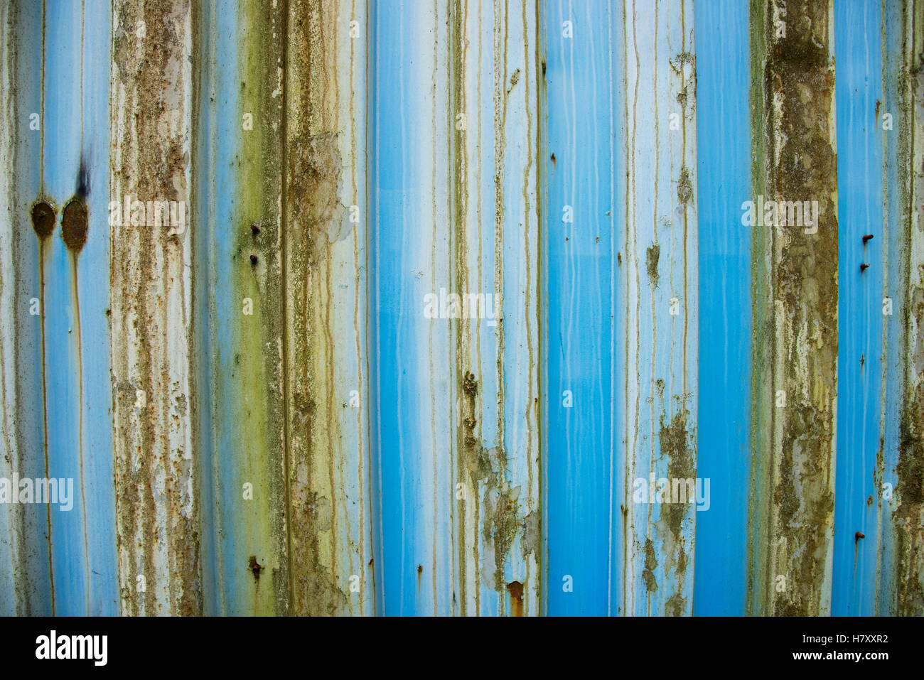 Rusty lines on an old blue farm building; Kincardine, Scotland Stock ...