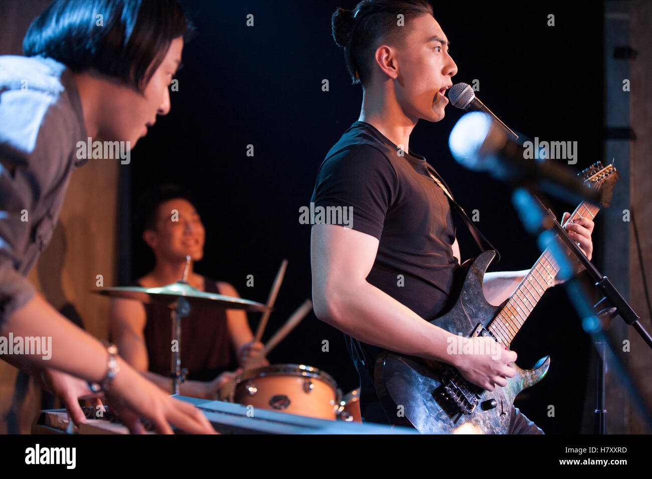 Chinese musical band performing on stage Stock Photo - Alamy