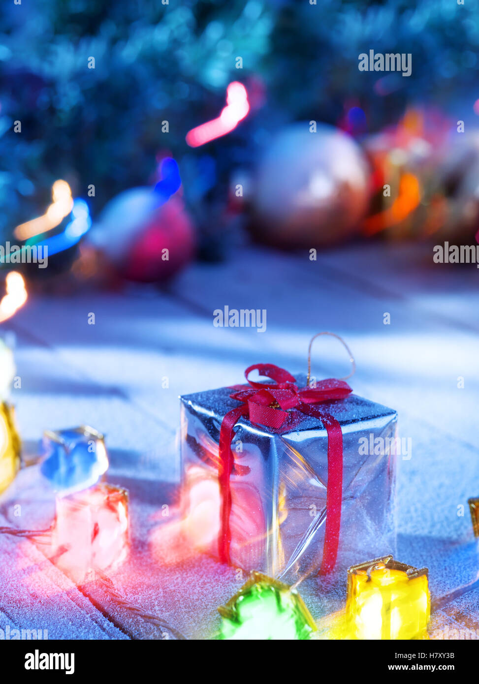 close up view of gifts boxes on snowbound wooden back Stock Photo - Alamy
