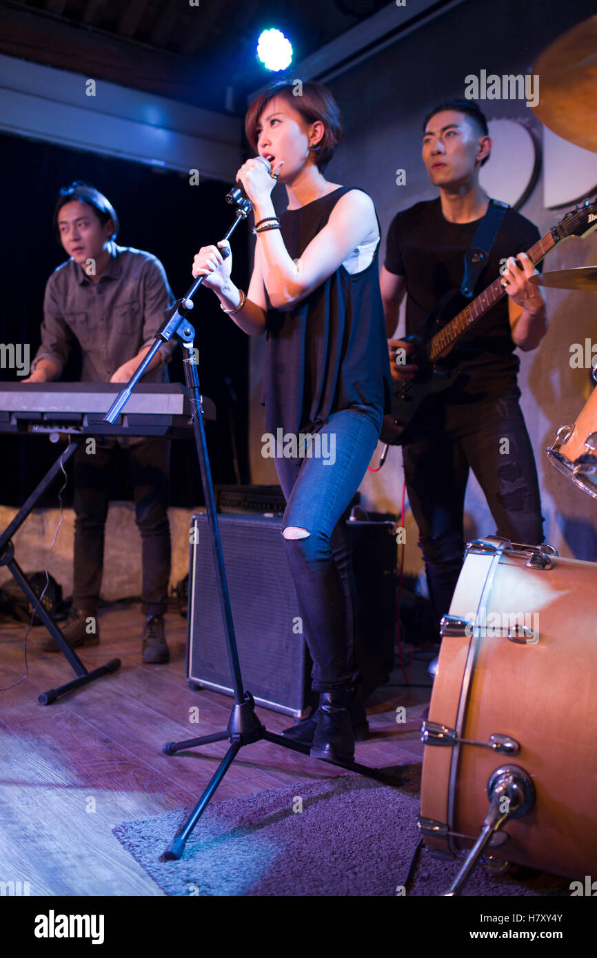 Chinese musical band performing on stage Stock Photo - Alamy