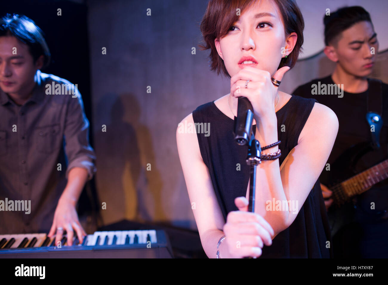 Chinese musical band performing on stage Stock Photo - Alamy