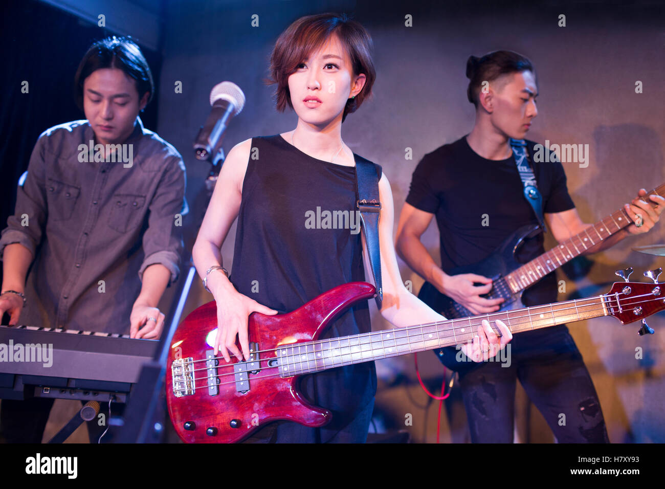 Chinese musical band performing on stage Stock Photo - Alamy
