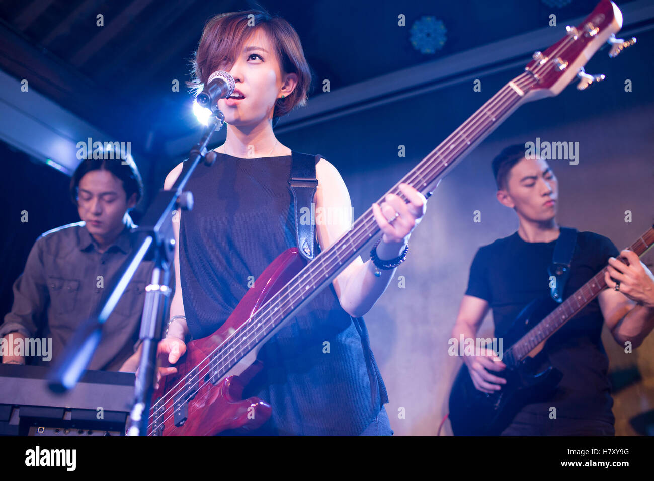 Chinese musical band performing on stage Stock Photo - Alamy