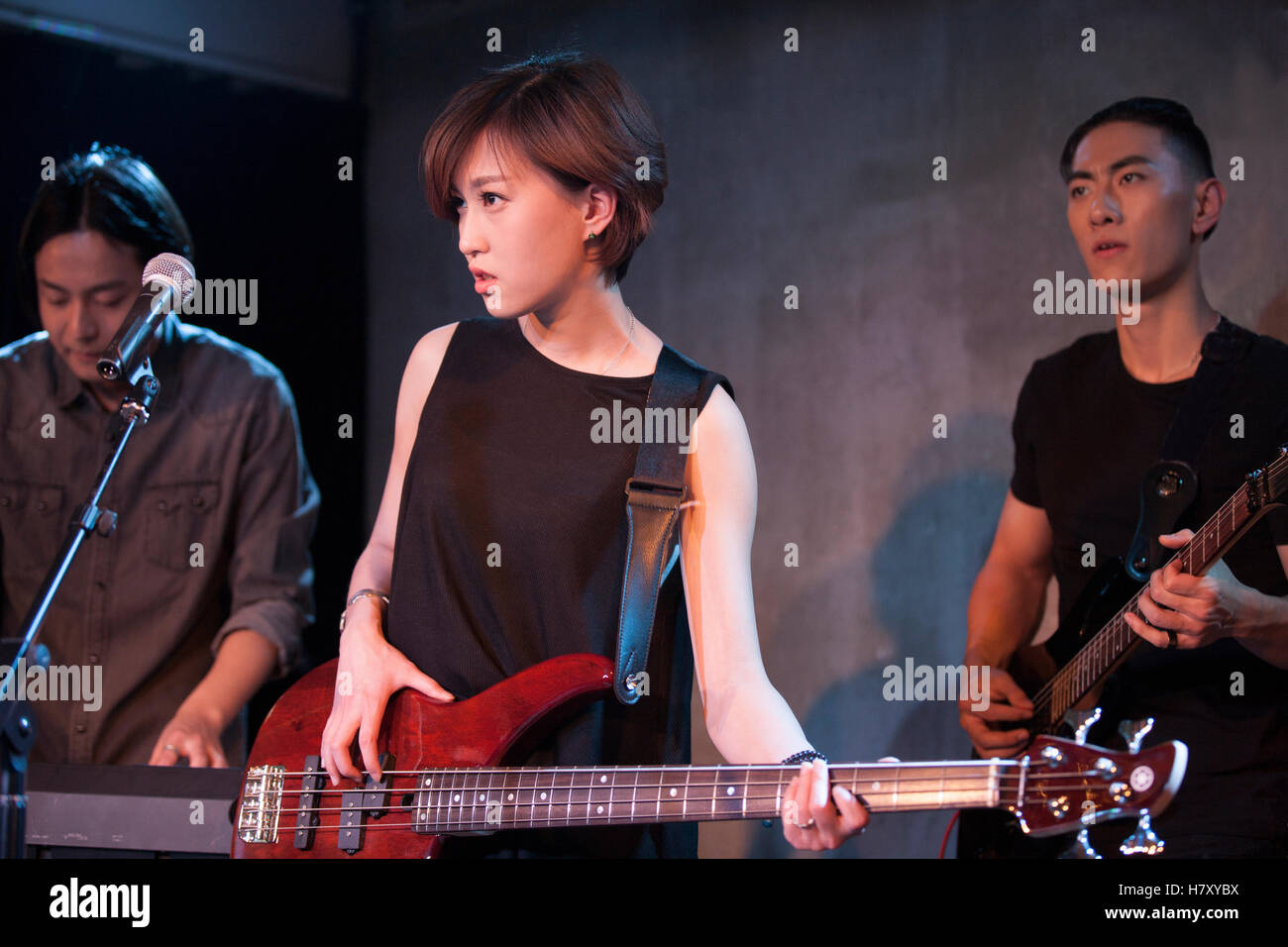 Chinese musical band performing on stage Stock Photo - Alamy