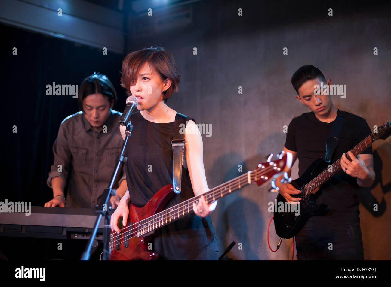 Chinese musical band performing on stage Stock Photo - Alamy