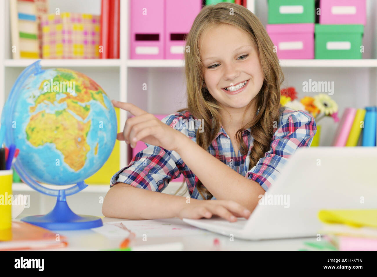 student girl with book and laptop Stock Photo - Alamy