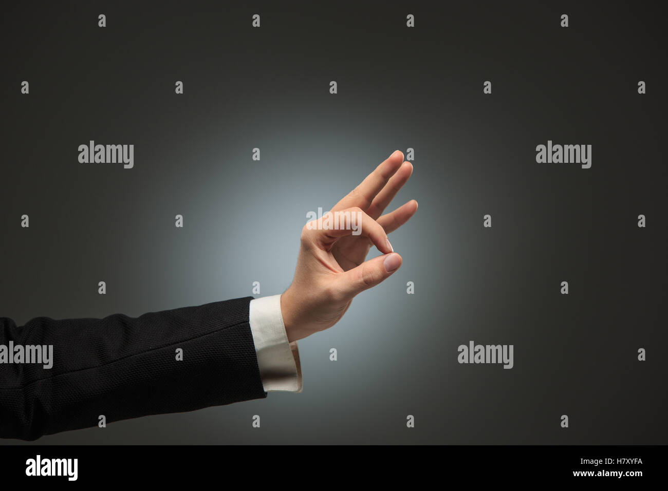 Business Man Hand and OK Sign Action Stock Photo - Alamy