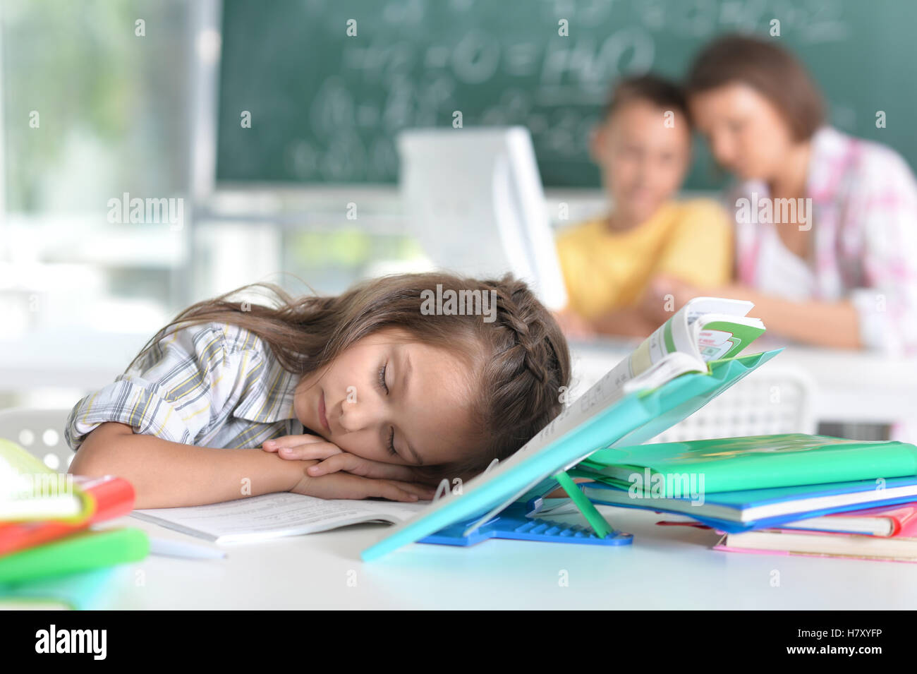 Tired girl sleeping Stock Photo - Alamy