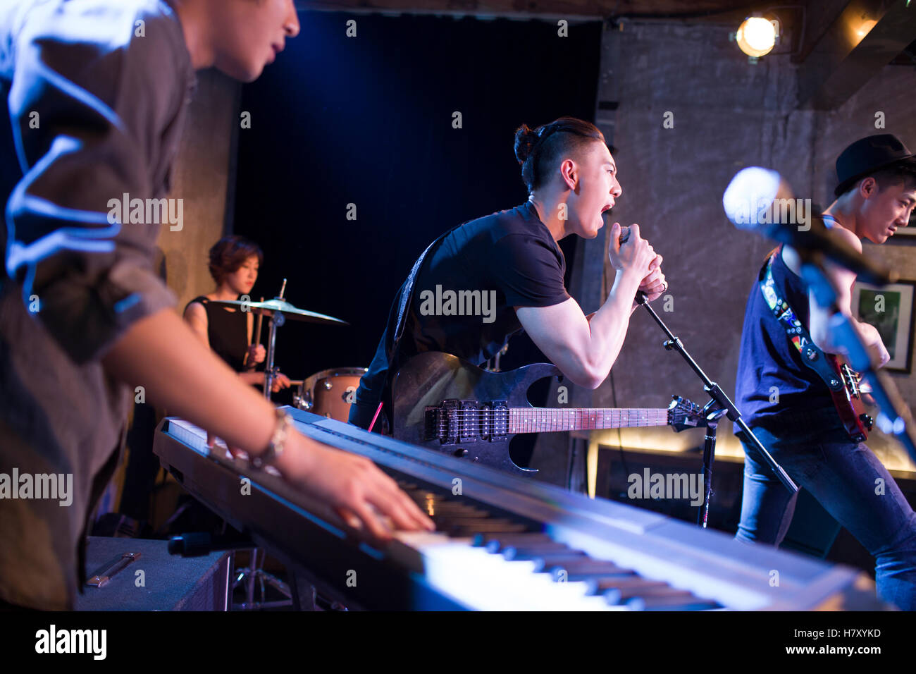 Chinese musical band performing on stage Stock Photo - Alamy