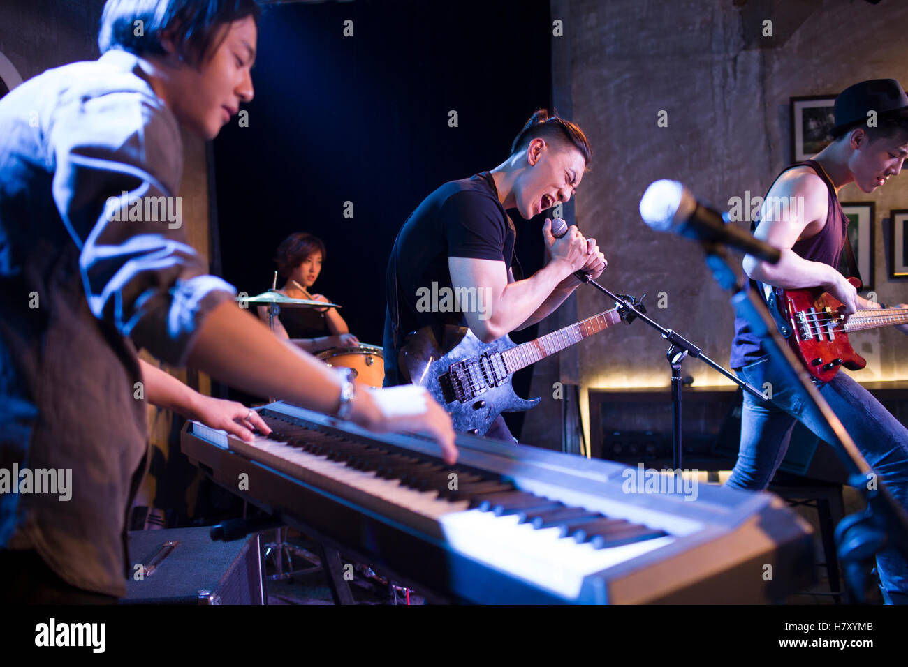 Chinese musical band performing on stage Stock Photo - Alamy