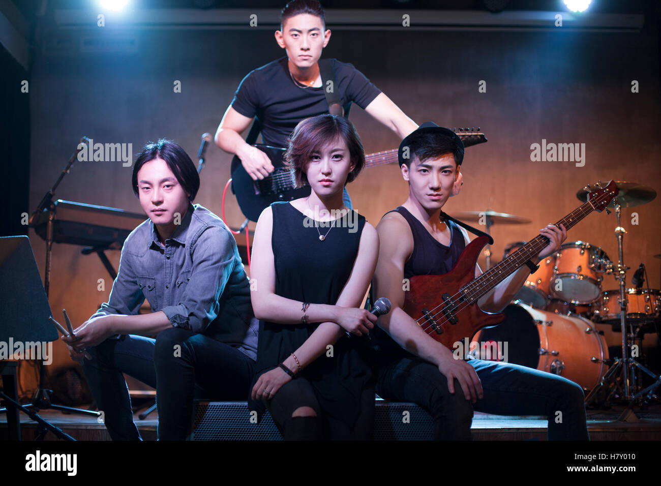 Confidence Chinese musical band on stage Stock Photo - Alamy