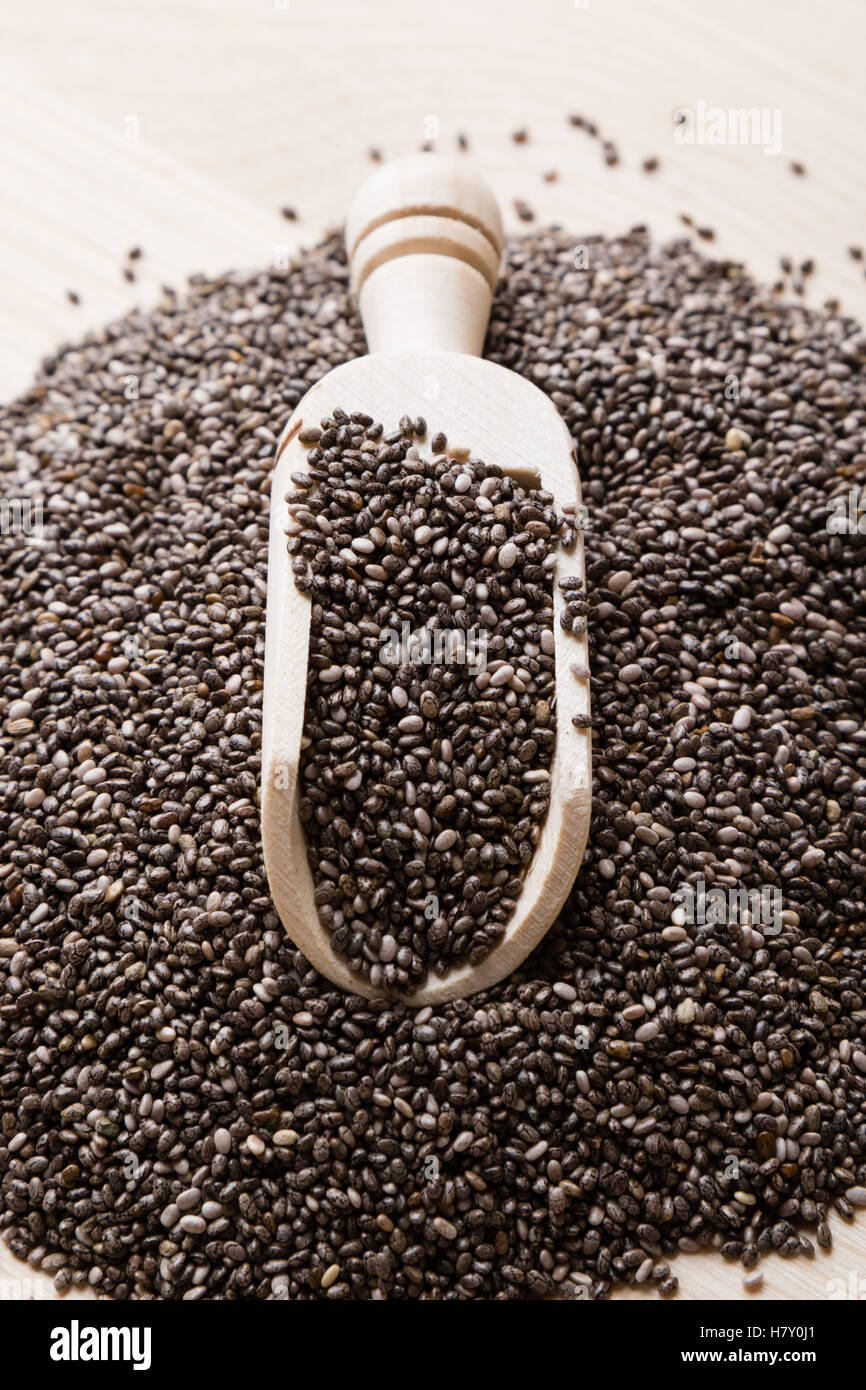 natural organic dry chia seeds on table with scoop Stock Photo - Alamy