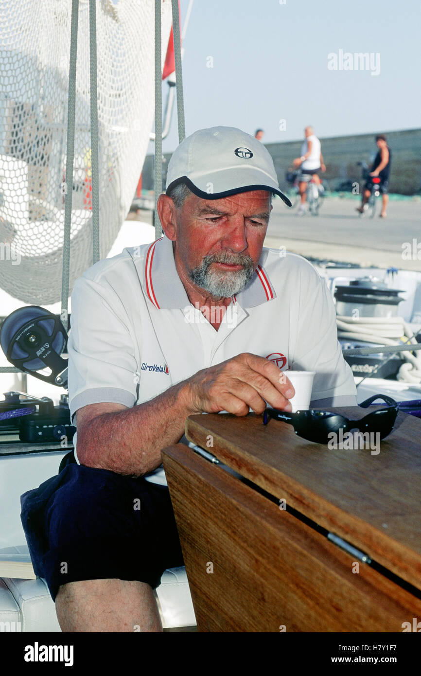 The famous italian skipper Cino Ricci (Rimini, 1934) on board of ...
