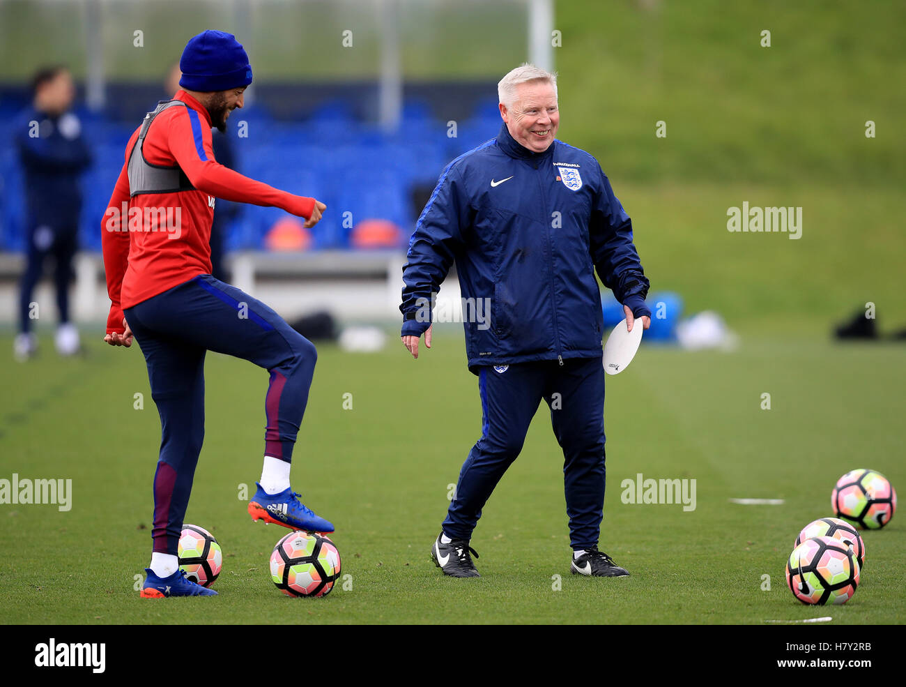 England assistant manager Sammy Lee (right) with Nathan Redmond (left ...