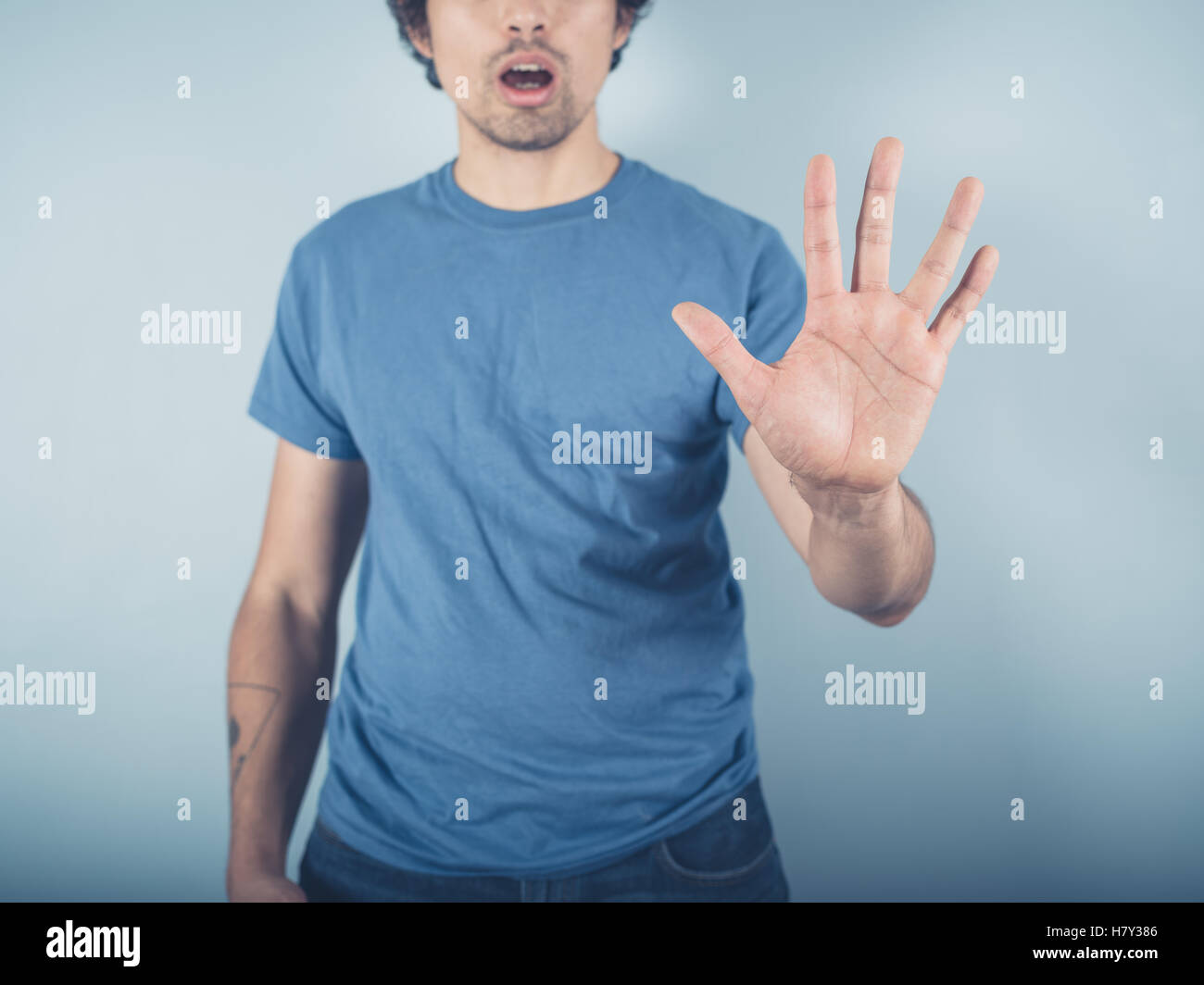 Man stop hand hi-res stock photography and images - Alamy