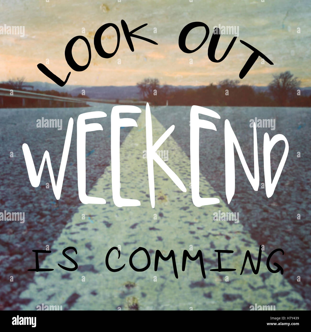 Inspirational quote about weekend on blurred background with road or ...