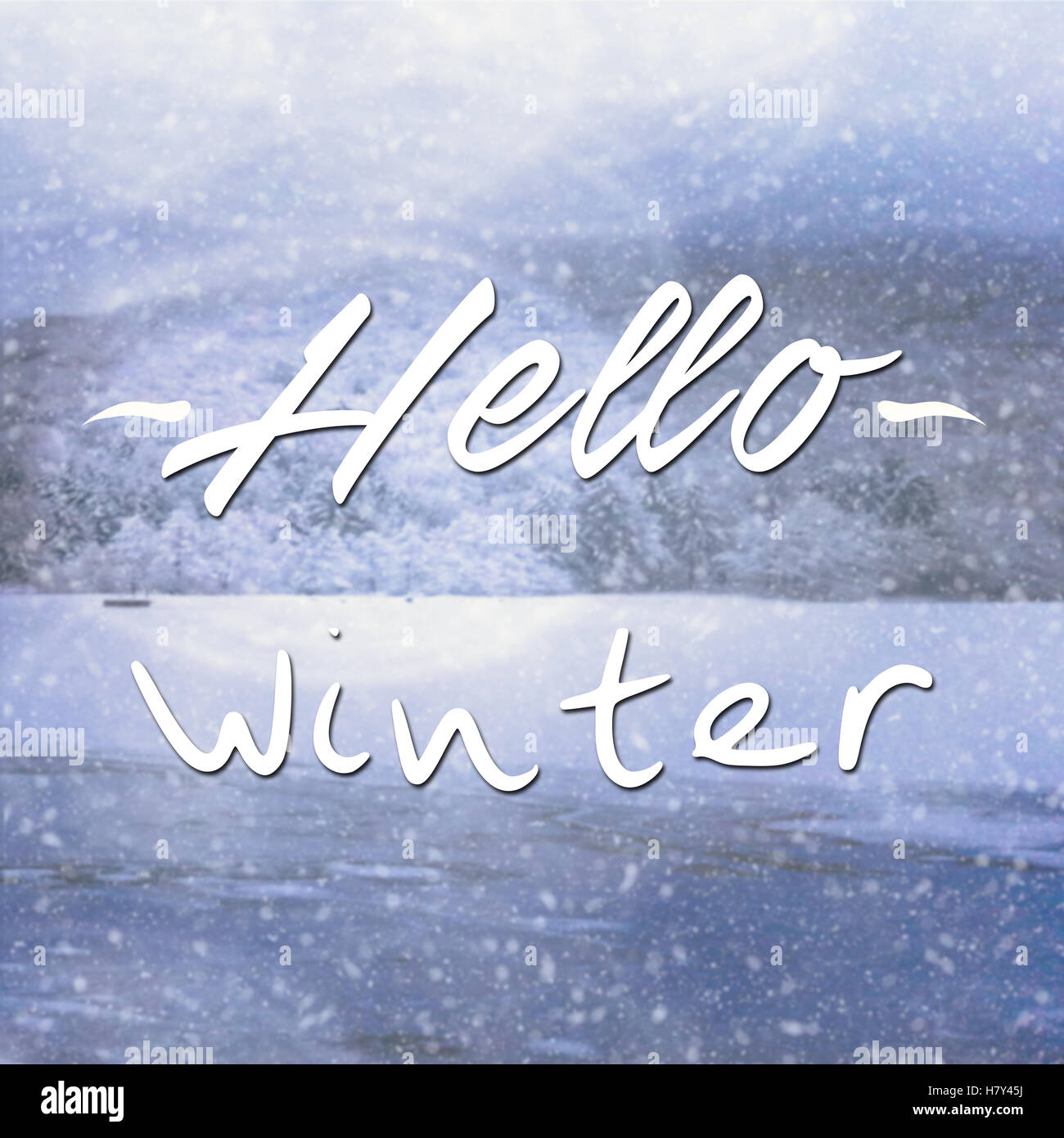 Inspirational quote hello winter on frozen snow background Stock Photo ...