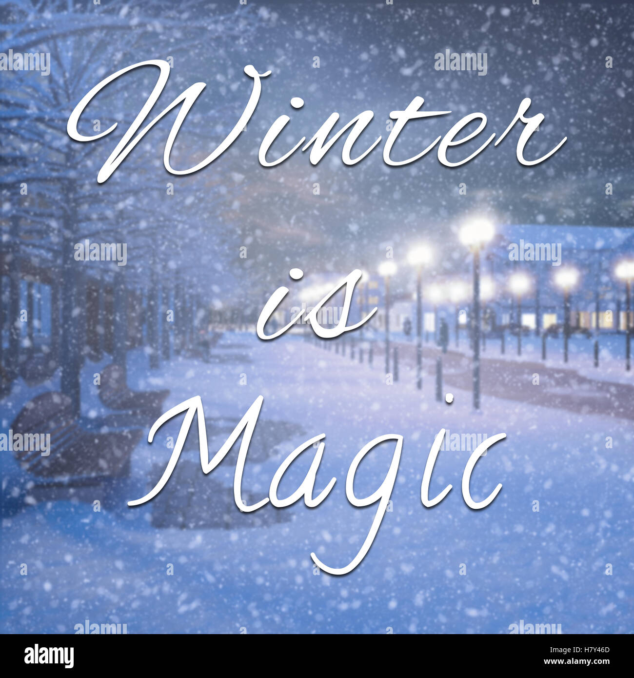 Winter is magic inspirational quote on blurred street view and banches ...